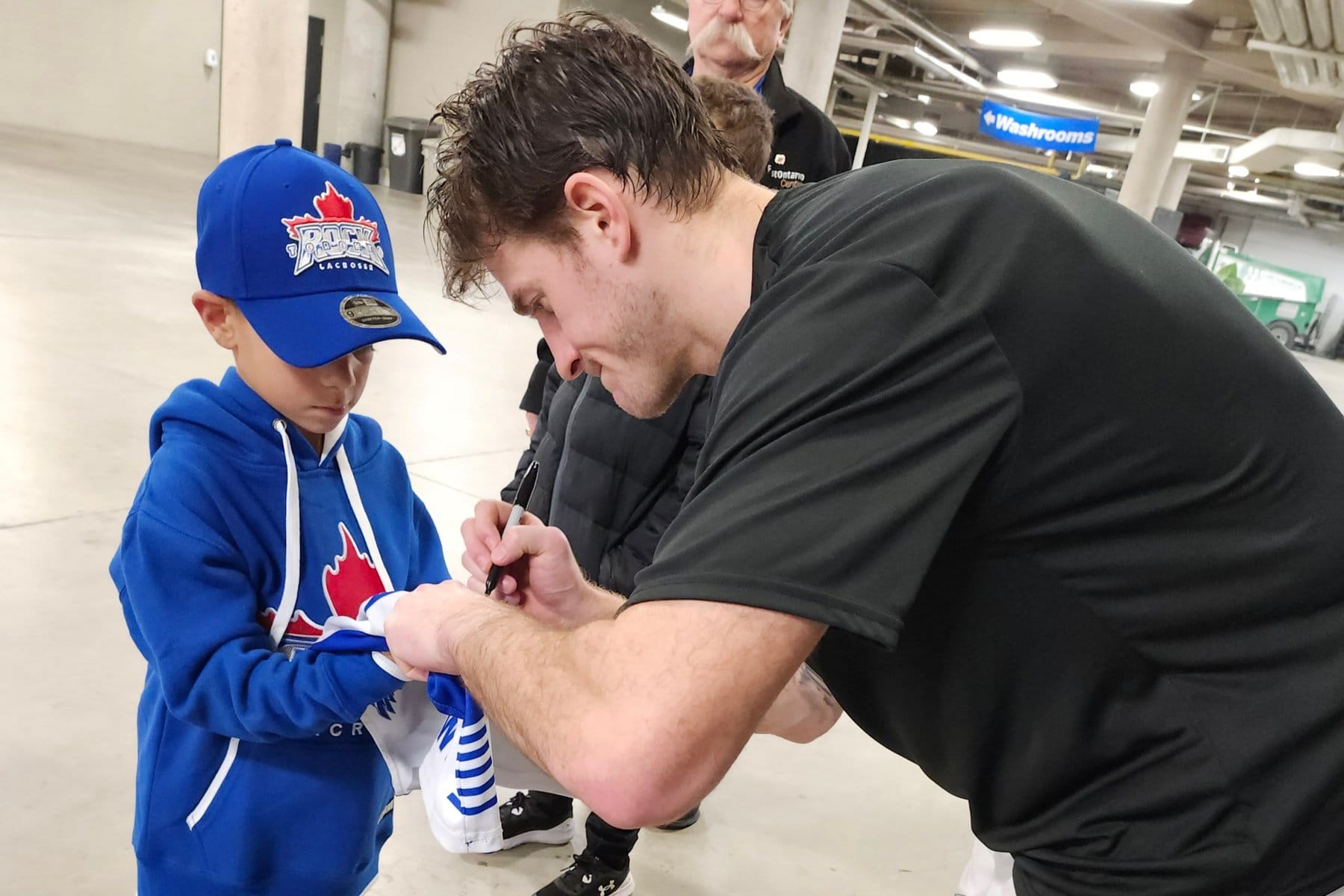 PHOTO GALLERY: NOTL lacrosse team plays before thousands at Rock game
